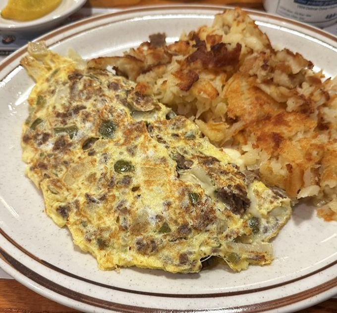 The Western omelet and home fries combo proves that sometimes the simplest pleasures are the most satisfying, especially when executed with diner precision.