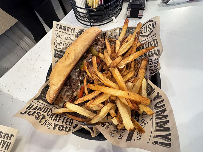 This isn't just a sandwich&mdash;it's an architectural marvel of beef, melted cheese, and perfectly golden fries that demands respect.