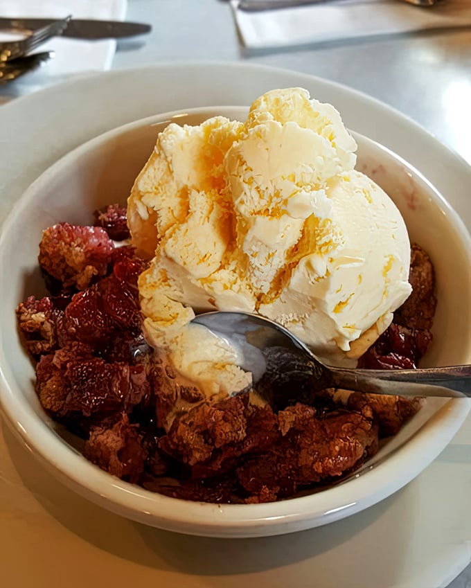 The perfect cobbler doesn't exi&mdash; Oh wait, here it is! Warm fruit nestled under a crumbly topping, melting ice cream creating rivers of vanilla.