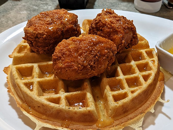 Chicken and waffles: the breakfast-lunch alliance that proves opposites don't just attract&mdash;they create culinary magic worth crossing state lines for.
