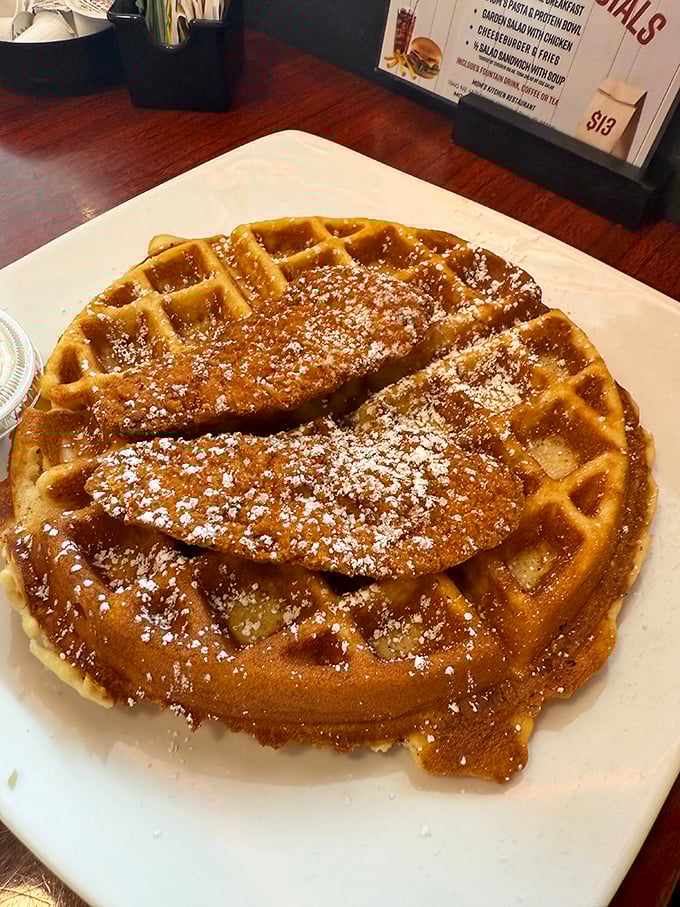 This Belgian waffle topped with chicken isn't just breakfast&mdash;it's a diplomatic summit between morning and afternoon flavors.