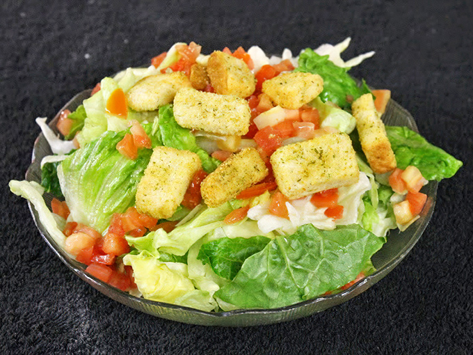 Even the salad game is strong here &ndash; crisp romaine, fresh tomatoes, and house-made croutons that put sad drive-thru salads to absolute shame.