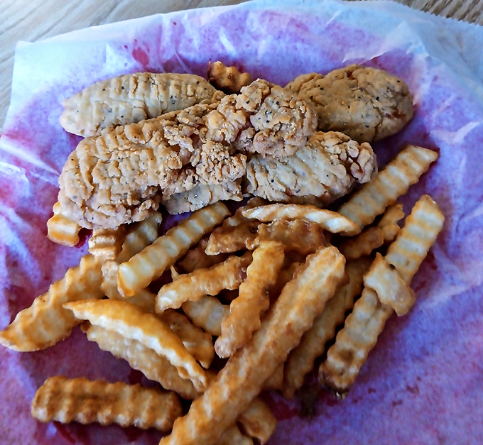 Chicken fingers and crinkle-cut fries &ndash; proof that sometimes the simplest pleasures are the most satisfying. Crispy, juicy, and utterly devoid of pretension.