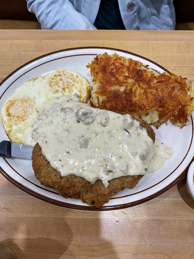 Country-fried steak smothered in gravy that your cardiologist warned you about, but your taste buds will thank you for ignoring medical advice.