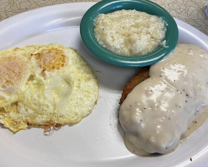 This chicken fried steak smothered in creamy gravy isn't just comfort food&mdash;it's therapy on a plate, no appointment necessary.