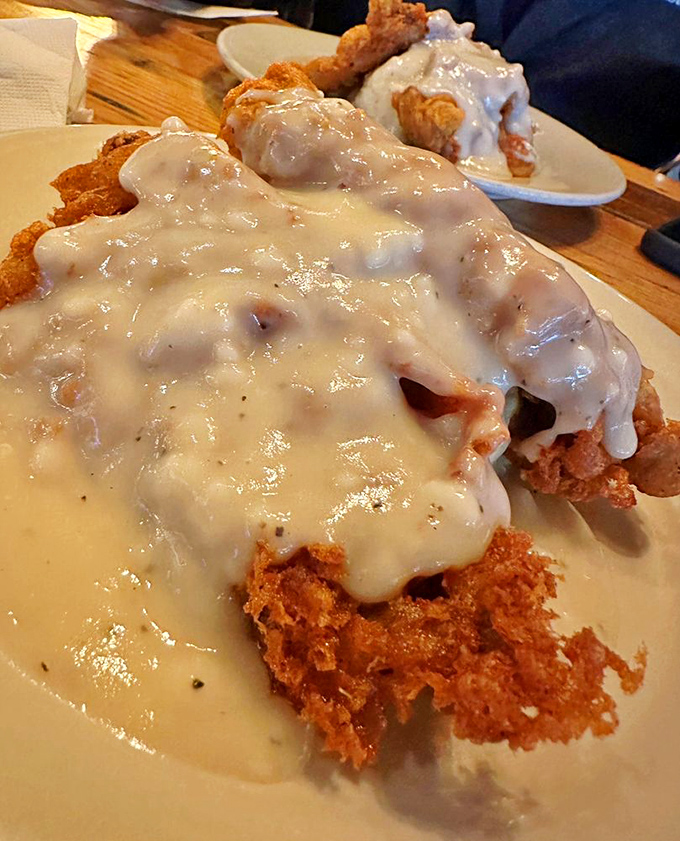 Chicken fried steak swimming in creamy gravy&mdash;the South's answer to comfort food that hugs your insides like a warm blanket on a cold day.
