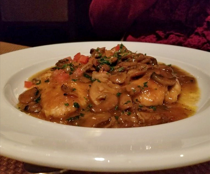 Chicken Marsala that's swimming in a mushroom sauce so rich it probably has its own accountant and summer home in the Hamptons.