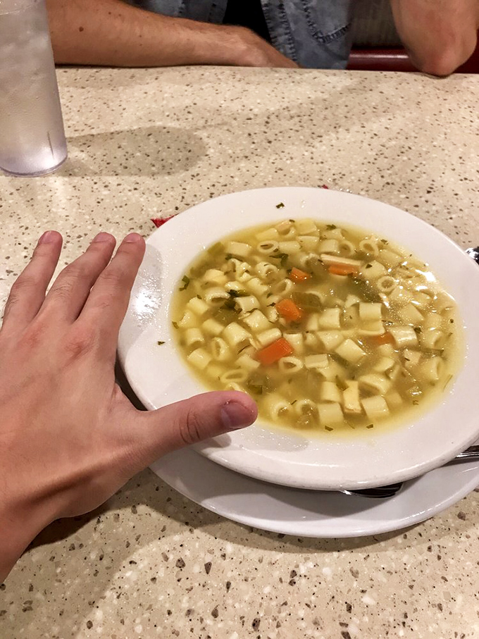 A bowl of chicken noodle soup that would make your grandmother nod in approval. Simple, honest food that heals the soul.