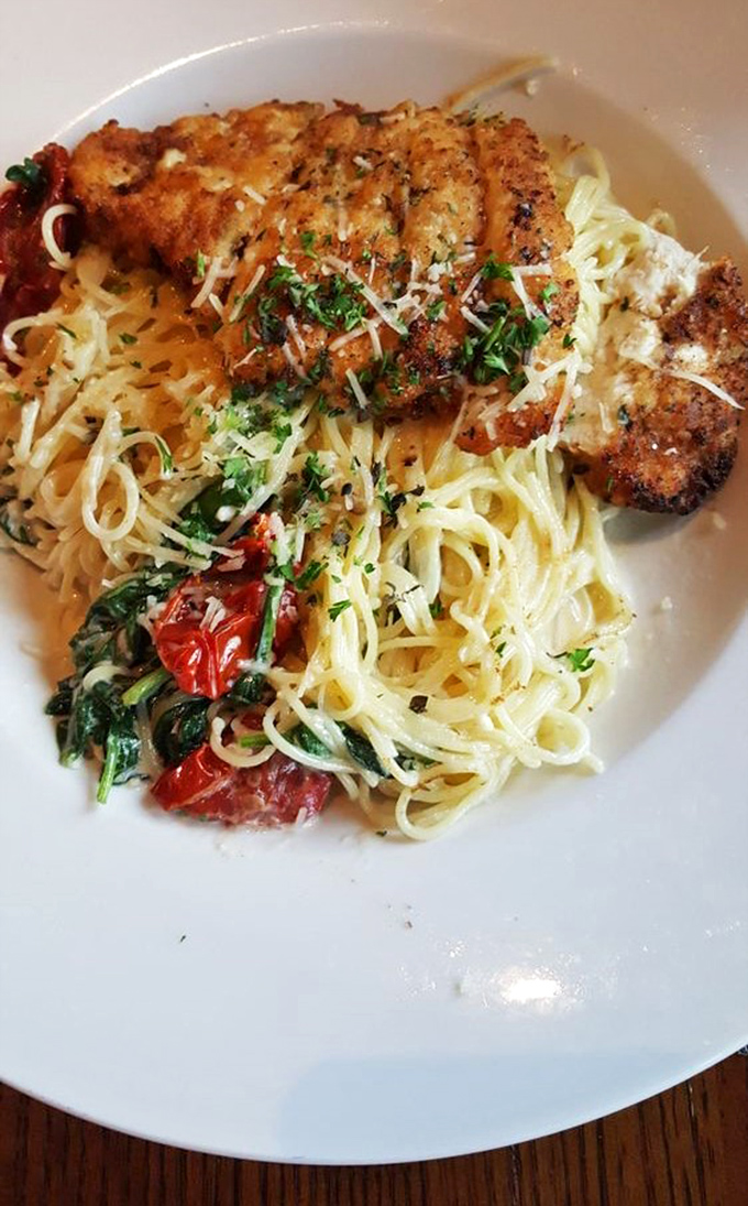 Perfectly golden chicken parmesan atop a tangle of pasta&mdash;proof that Lord Fletcher's isn't just about lake fish, they're fluent in comfort food of all dialects.