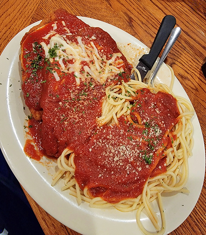 Spaghetti and chicken parmesan that would make any Italian grandmother nod in approval. That sauce-to-cheese ratio? Mathematical perfection.