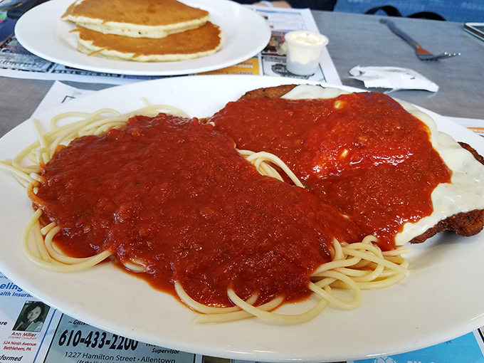 Spaghetti and sauce that would make any Italian grandmother nod in approval. The red sauce blanket covers pasta cooked to that elusive perfect doneness.