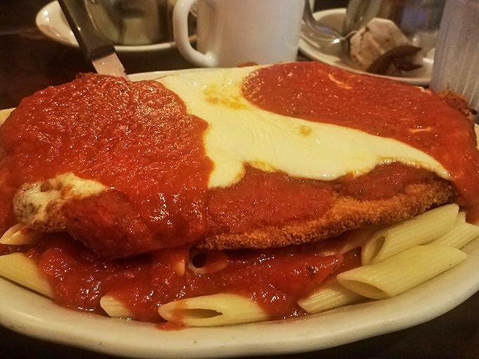 Chicken Parmigiana done right&mdash;a crispy cutlet swimming in marinara with melted cheese that stretches with each forkful like an Italian love song.