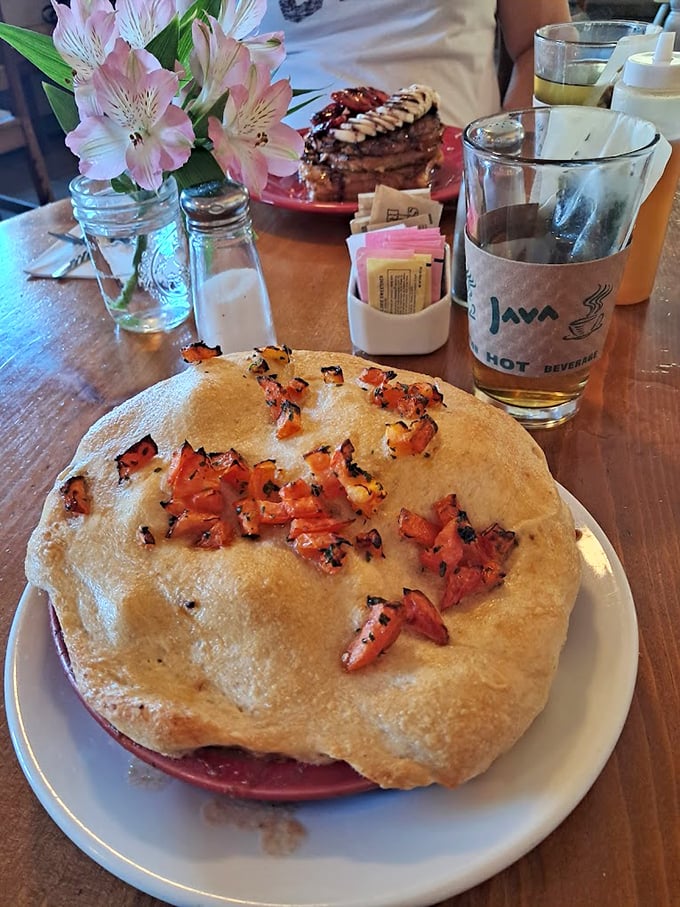 Whoever said "pie is just for dessert" never met this savory beauty. The golden pastry practically winks at you, promising flavors that dance between continents.
