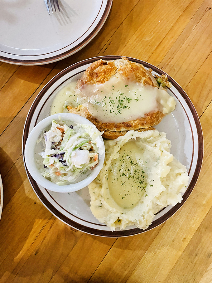This chicken pot pie isn't just dinner&mdash;it's a hug on a plate, with its golden crown of pastry hiding a steamy treasure of comfort below.