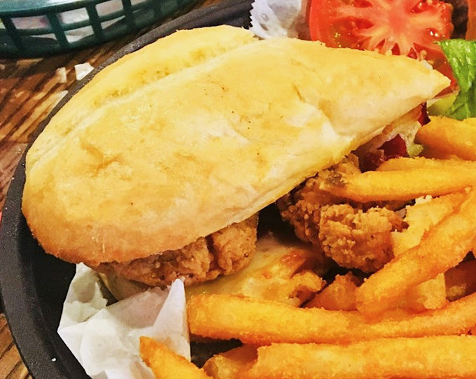 A chicken sandwich that demands a two-handed commitment, with crispy goodness peeking out from a perfectly toasted bun.