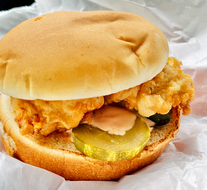 The chicken sandwich that launched a thousand road trips. Simple yet spectacular with that golden-fried chicken, pickles, and soft bun&mdash;proof that perfection needs no complications.
