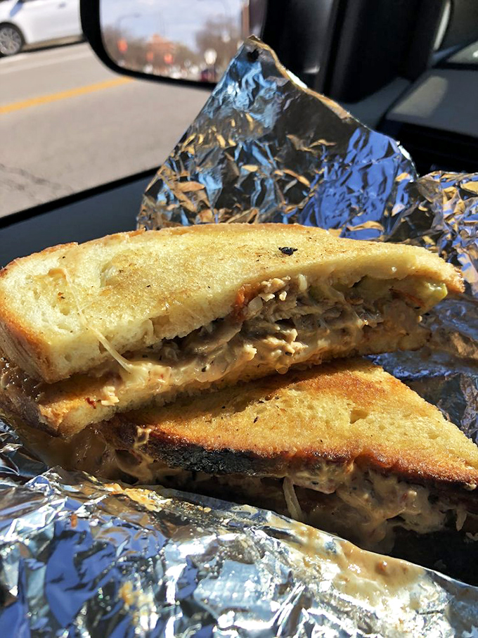 A sandwich so perfectly grilled it deserves its own Instagram account. That melty interior peeking out is basically cheese's way of winking at you.