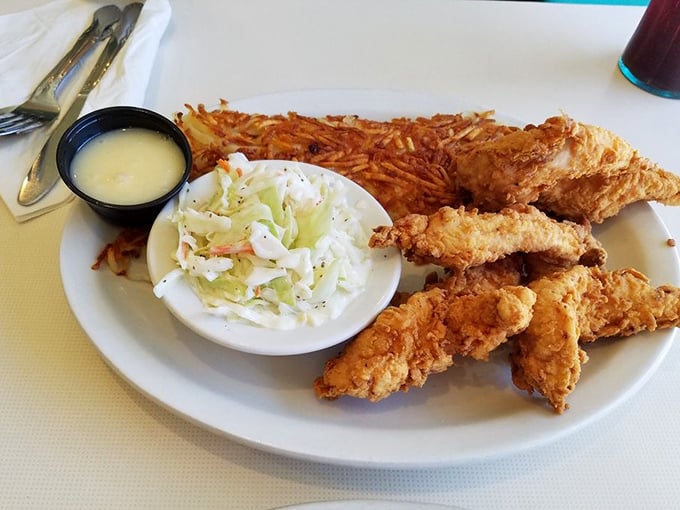 These chicken tenders aren't just crispy&mdash;they're life-affirming. Served with creamy coleslaw and crispy hashbrowns that would make your grandmother proud.
