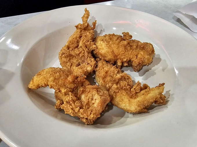 Chicken tenders so perfectly golden they deserve their own trophy. Forget fancy cuisine&mdash;sometimes simple pleasures win the day.