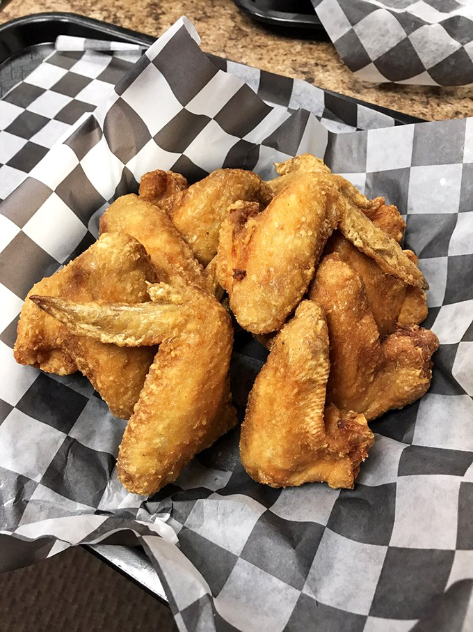 Golden-fried chicken wings that could convert even the most devoted buffalo sauce loyalist to new flavor horizons.