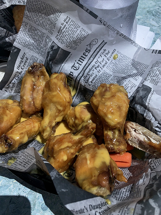 Wings that make you question everything you thought you knew about chicken. Glazed, glistening, and gone too quickly.