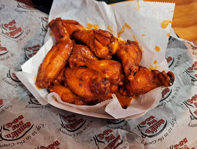 These aren't just wings; they're flavor vehicles, glistening with sauce and demanding to be devoured with reckless abandon.