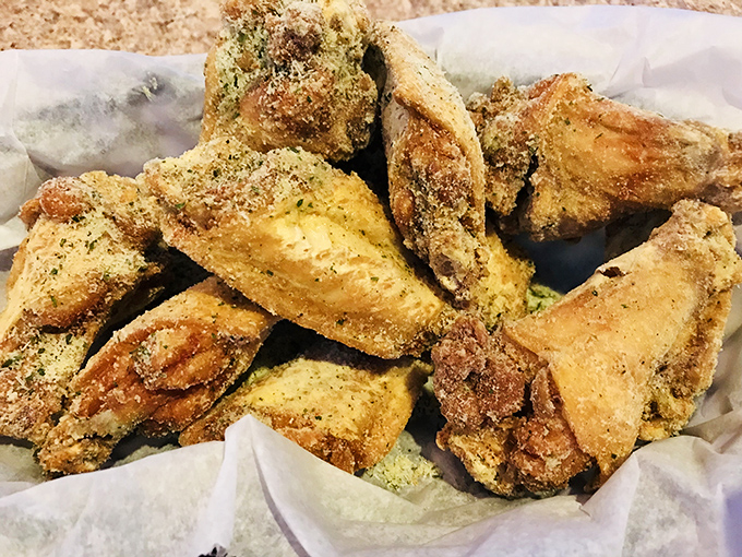 These wings come dressed in their Sunday best, crispy and golden, ready for their sauce bath.