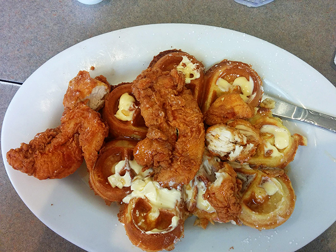Chicken and onion rings playing together on a plate like old friends at a reunion&mdash;crispy, indulgent, and worth every moment on the treadmill tomorrow.