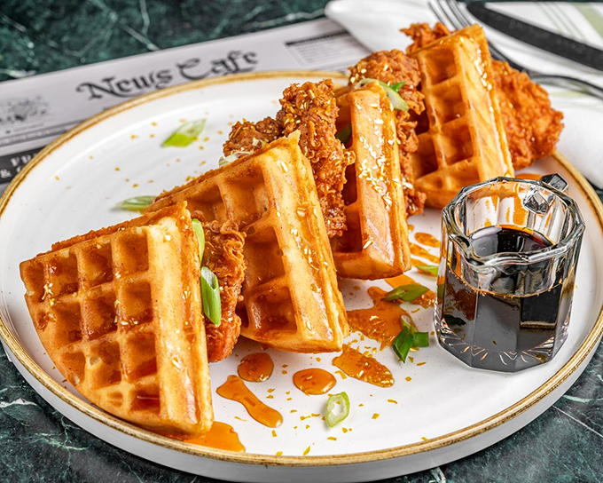 Chicken and waffles: where breakfast meets dinner in a harmonious relationship that's outlasted most Hollywood marriages.