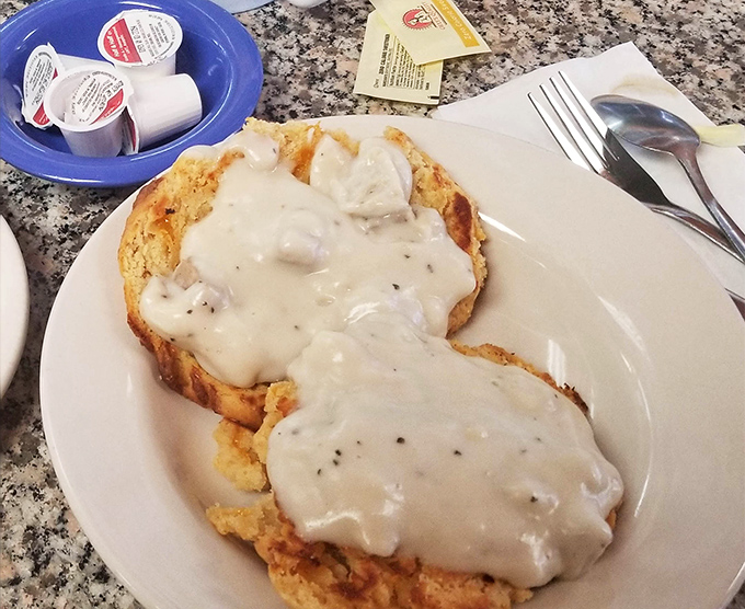 Biscuits smothered in creamy country gravy &ndash; comfort food that wraps around you like your grandmother's warmest hug on a chilly Massachusetts morning.