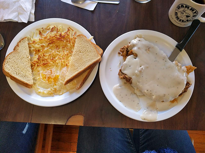 Country fried steak and eggs – the breakfast equivalent of a warm hug from someone who truly understands what comfort food means.