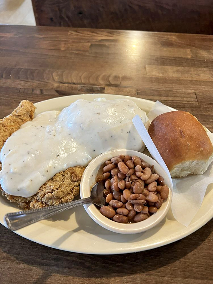 Chicken fried steak swimming in gravy so good you'll be tempted to ask for a straw. Those beans aren't an afterthought&mdash;they're tradition.