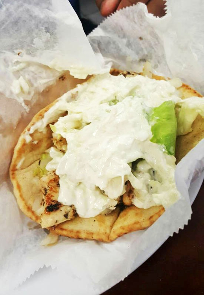 This isn't just a sandwich; it's a handheld feast wrapped in paper, where every bite delivers a perfect balance of creamy, crunchy, and savory.