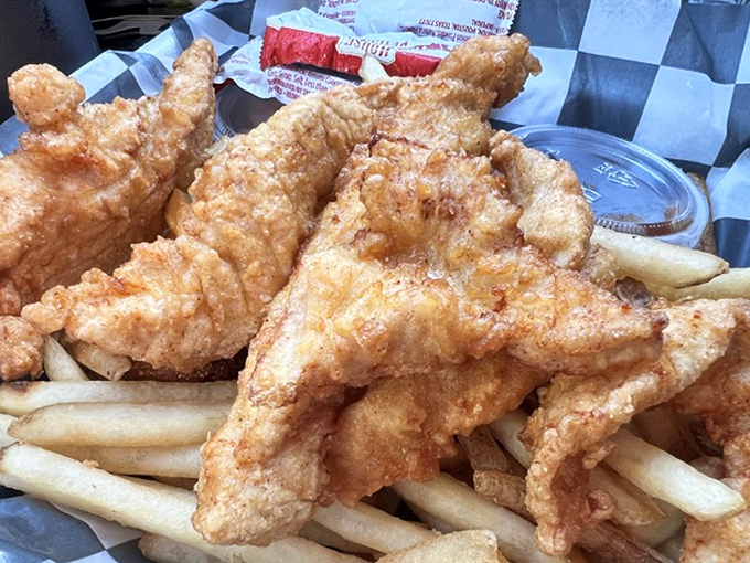Even the chicken tenders get the royal treatment here&mdash;hand-cut, hand-breaded, and fried to a crispness that would make Colonel Sanders weep with envy.