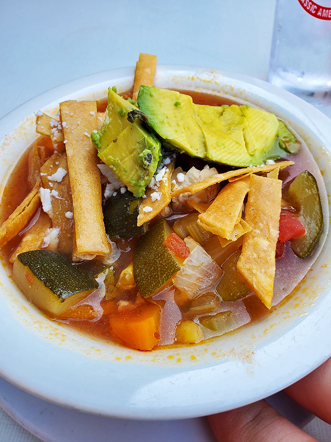 Tortilla soup that puts the "comfort" in comfort food. Those crispy strips aren't just garnish&mdash;they're the exclamation points of deliciousness.