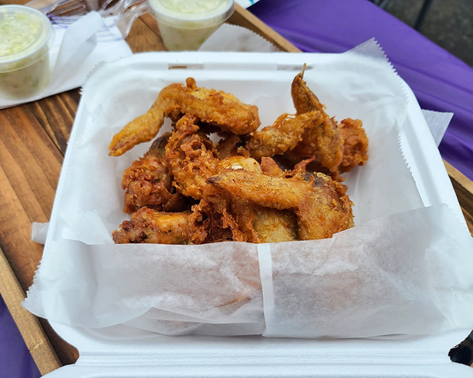 Golden-fried chicken wings that crackle with each bite. The kind that make you wonder why you ever bothered with chain restaurants.