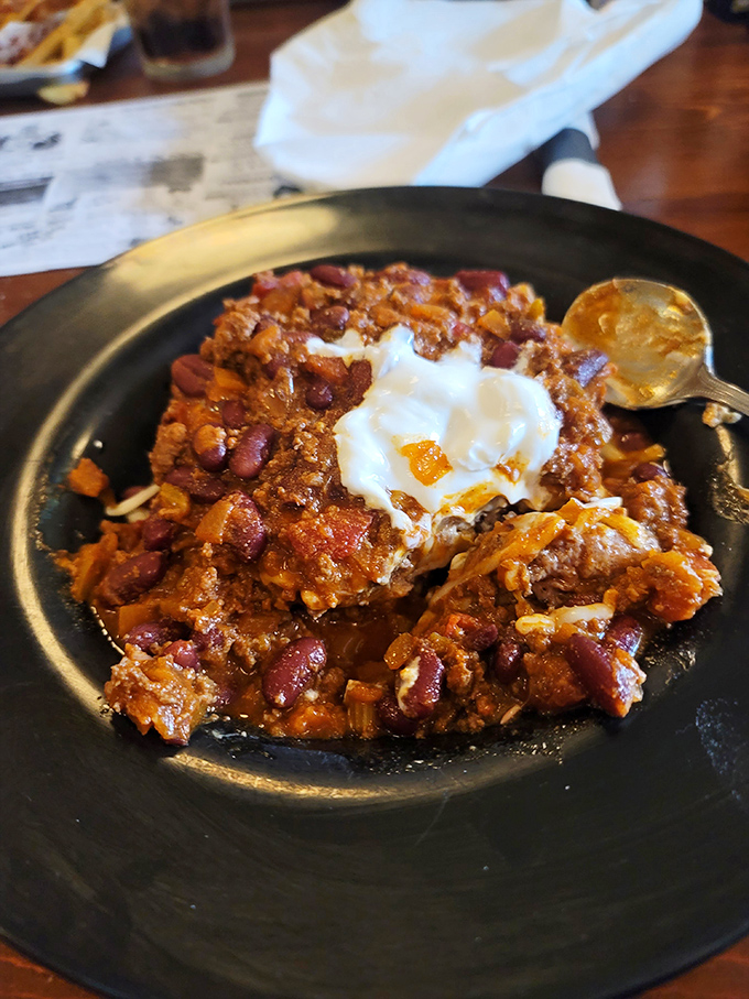 Whitey's famous chili comes topped with a dollop of sour cream and an egg&mdash;comfort food that's been promoted to gourmet status.