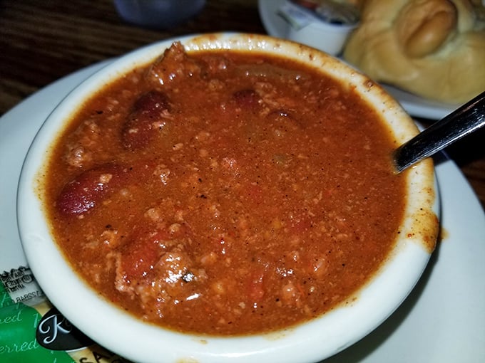 A bowl of chili that looks like it's been simmering since breakfast, developing the kind of flavor that makes winter almost welcome in Ohio.