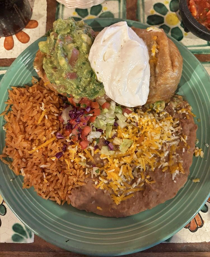 This isn't just a chimichanga &ndash; it's a masterclass in texture with that perfect crisp-to-soft ratio and enough guacamole to make a millennial swoon.