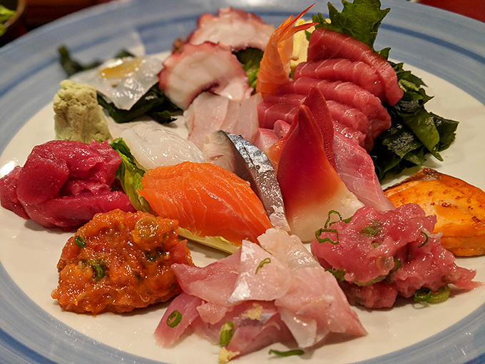 This sashimi platter isn't just food&mdash;it's an edible color wheel of ocean treasures, each slice promising its own distinct moment of pure joy.