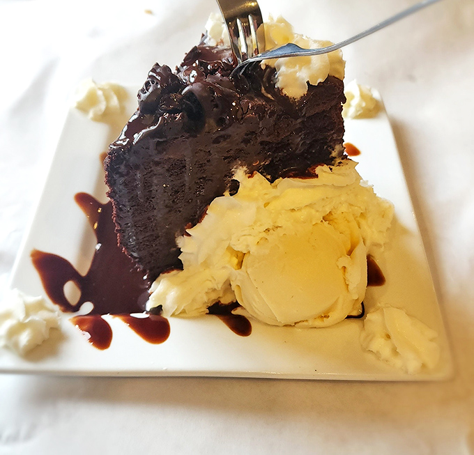 Death by chocolate never looked so appealing&mdash;rich cake paired with vanilla ice cream creates the dessert equivalent of a standing ovation.