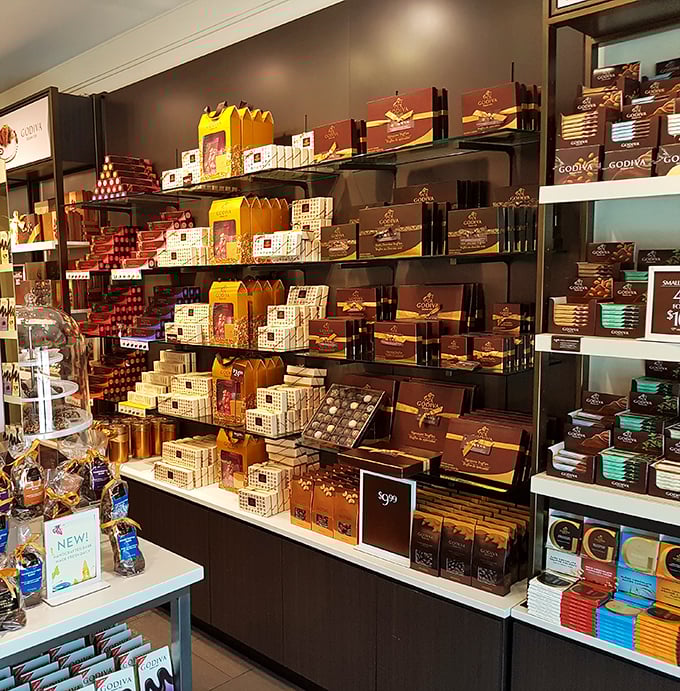 Godiva's chocolate display&mdash;where diet resolutions go to die and "just one piece" becomes a mathematical impossibility.