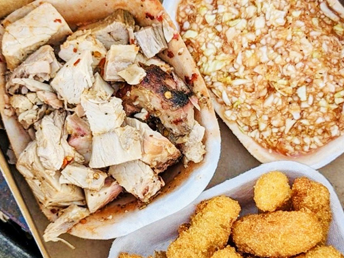 Chopped pork with that telltale pink smoke ring&mdash;the barbecue equivalent of finding the Hope Diamond. Each morsel carries decades of hickory-smoked wisdom.