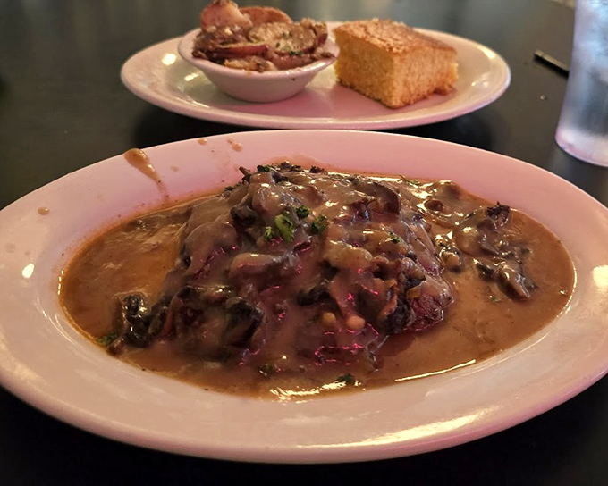 Chopped steak swimming in rich gravy with cornbread standing guard&mdash;this is comfort on a plate.