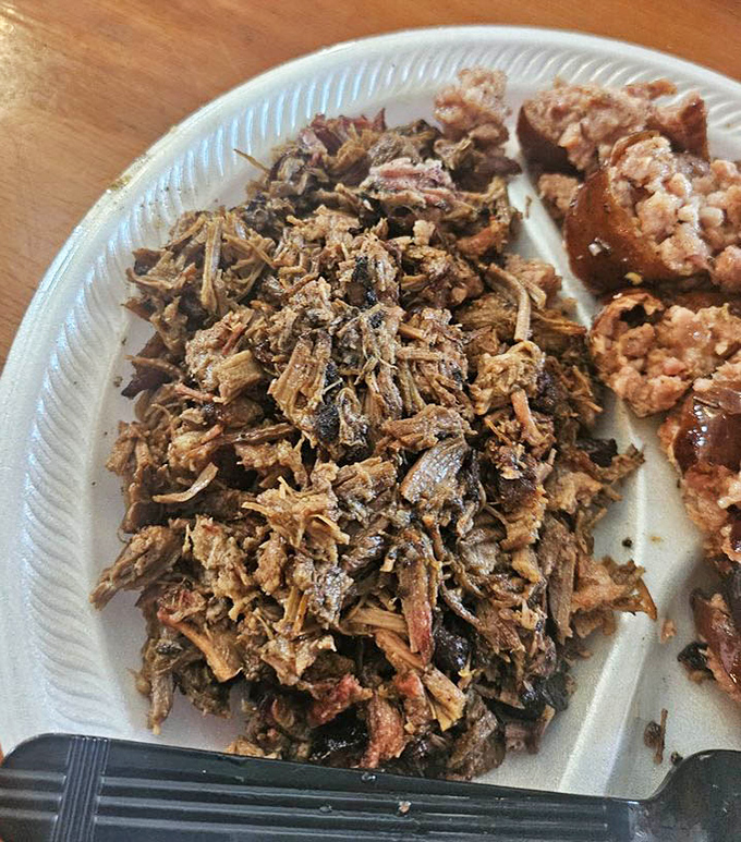 Not all chopped brisket is created equal. This mountain of smoky, tender beef has clearly earned its PhD in flavor science.