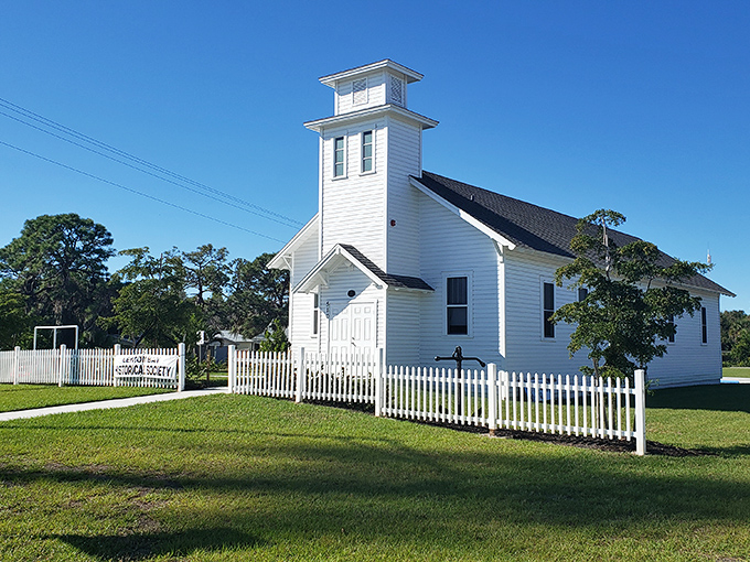 Old Florida charm preserved in white clapboard and picket fences. Community churches like this one remain social anchors in Englewood, where Sunday best still means something.