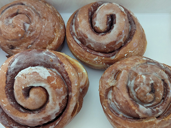 These cinnamon rolls don't just speak to you – they serenade you with their spiral perfection and generous glaze that melts just right into every nook and cranny.