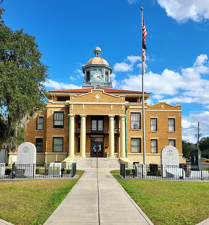 The courthouse's front view showcases columns that say "justice happens here" and a clock that reminds you it happens at a civilized hour.