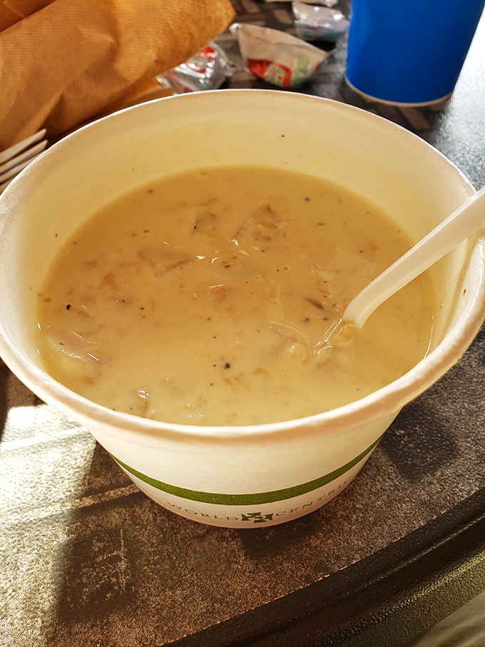 This isn't just clam chowder; it's a warm hug in a bowl, with each spoonful telling stories of the sea.