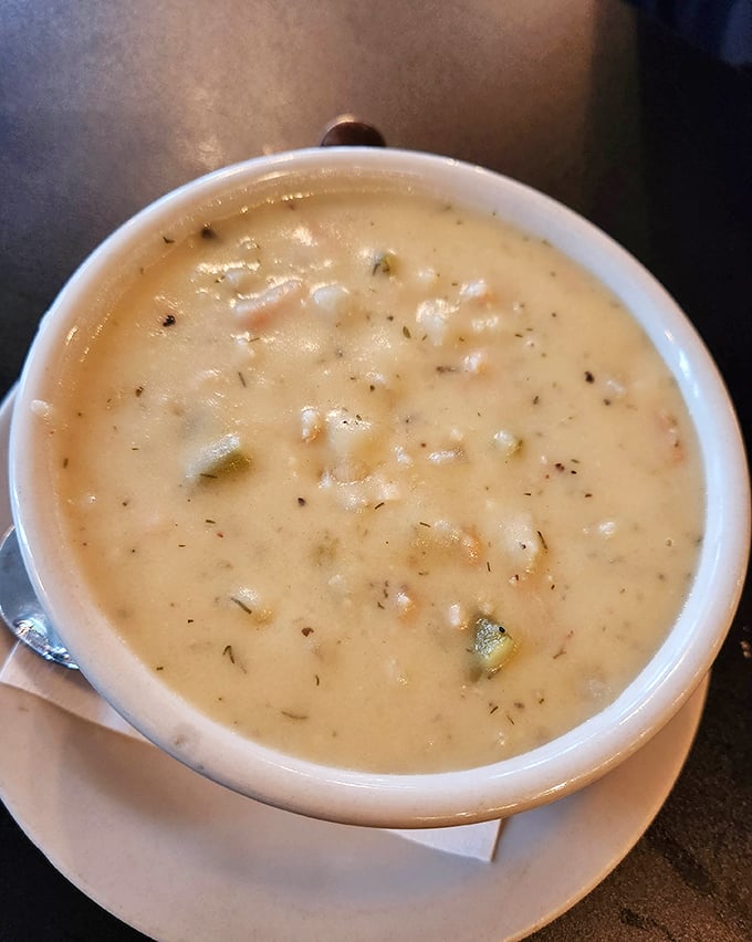 This isn't just clam chowder; it's a creamy bowl of comfort that would make New Englanders question their life choices.